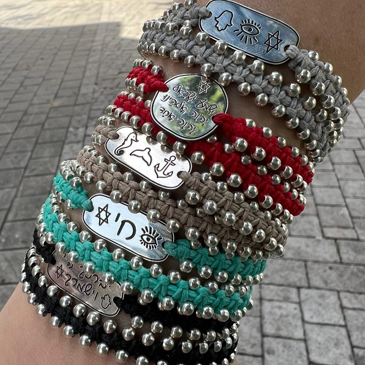 Macrame bracelet with silver beads and an Hebrew message 2 rows ...